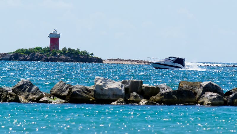 Boat and lighthouse stock image. Image of marine, colorful - 24733381