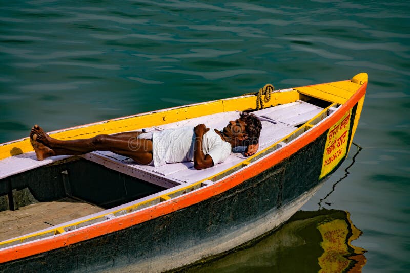 Boat Man Sleeping in Boat in Holly Ganga Editorial Stock Image - Image ...