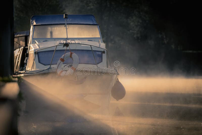 Boat in Mist on River Avon at Sunrise Stock Image - Image of sunbeam ...
