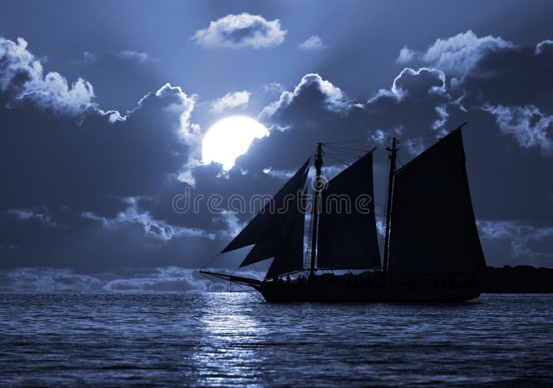 A boat on the moonlit seas stock photo. Image of sail - 23993690