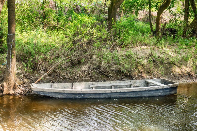 Boat in Mountain Stream in Green Forest at Spring Time Stock Photo ...