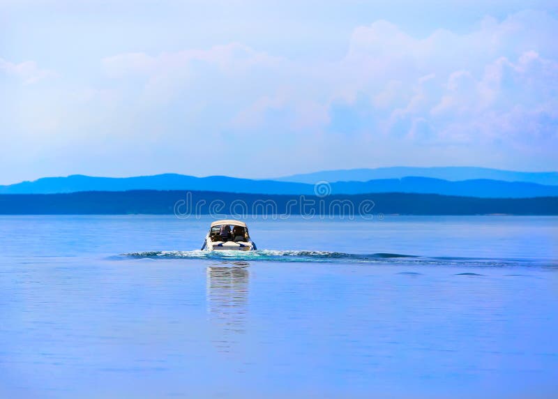 Boat Moving on a Water Surface Stock Image - Image of blue, reflection ...