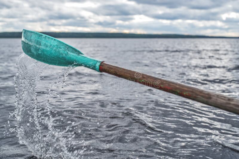 Boat Oar in the Water and Splashing Water Stock Image - Image of clean ...