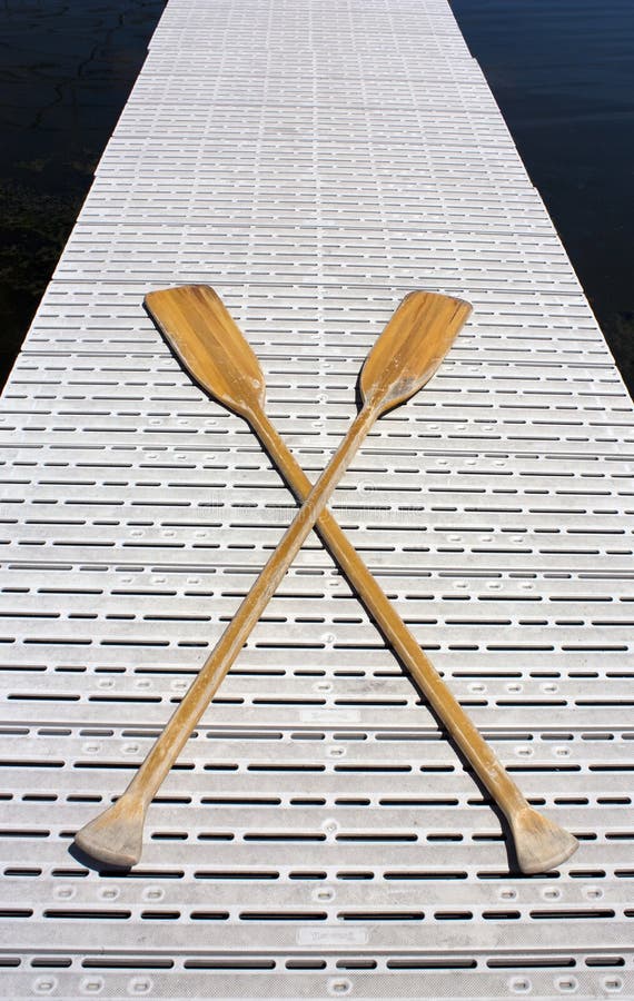 Boat Oars on a Dock stock photo. Image of paddle, deck - 20542008
