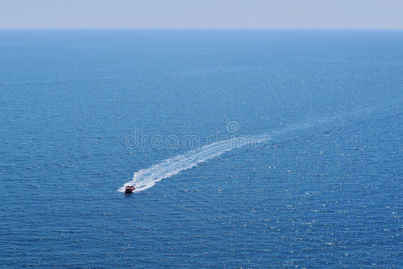 Boat in the open sea stock image. Image of summer, yachting - 147768693