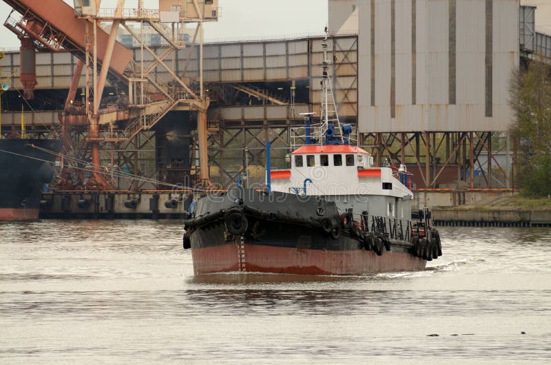 A Boat Operating at the Port. Stock Image - Image of work, sailor: 78335425