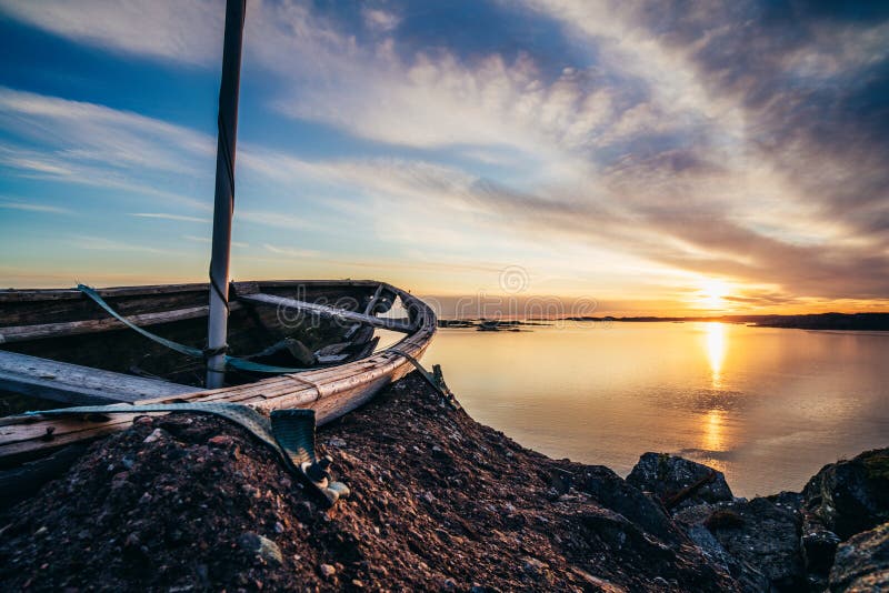 Boat over the sea stock photo. Image of dawn, sunset - 186726554