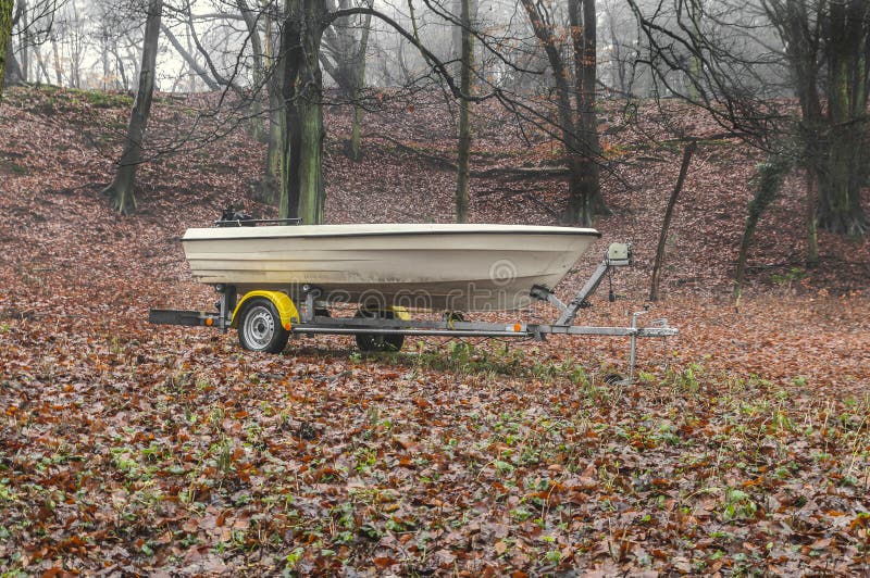 A boat parked in a forest stock image. Image of colour - 110846437