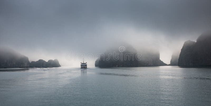 Mist in Ha Long Bay,Vietnam Stock Photo - Image of vietnam, reflection ...