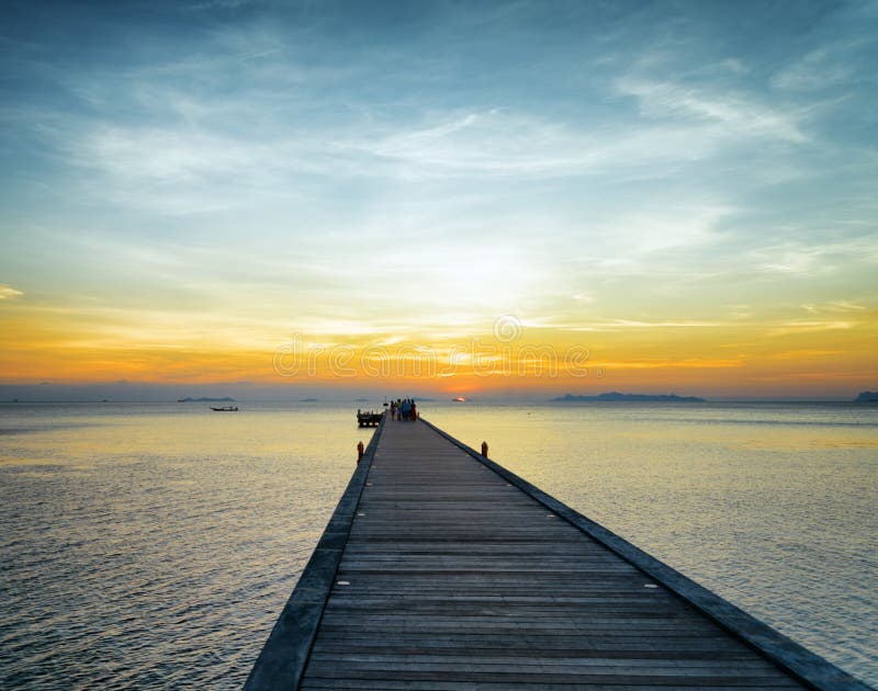 Boat pier at sunset stock photo. Image of holiday, sand - 30418194