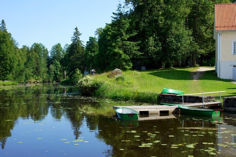Boat and pond stock image. Image of tree, lake, boat - 25618265