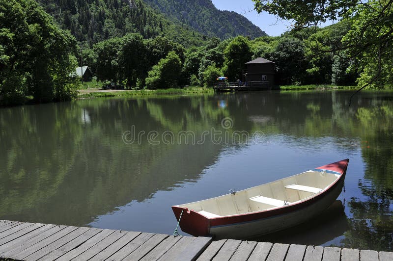 Boat on Pond stock image. Image of camp, gorgeous, print - 7648141