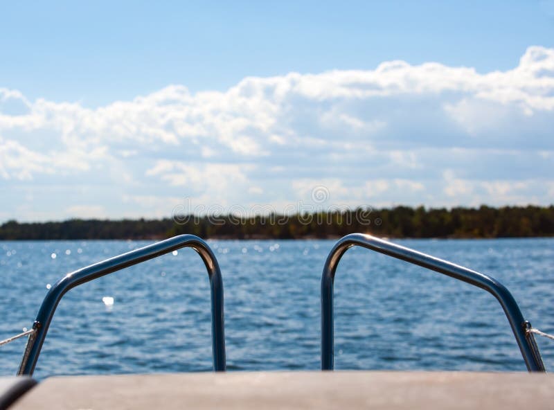 Boat through railing stock image. Image of island, cliffs - 997447