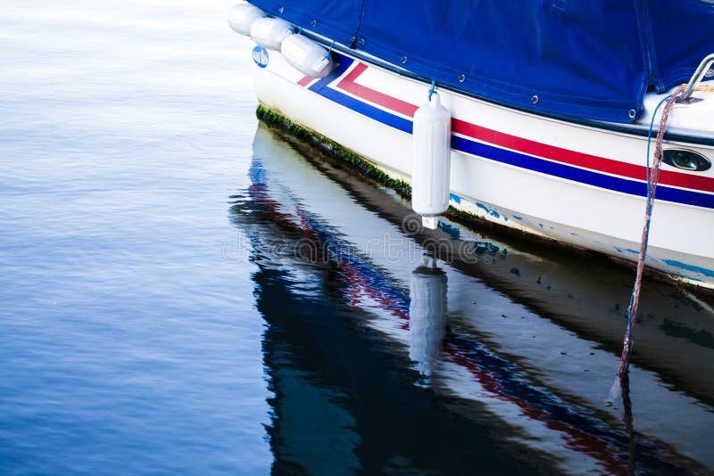 Boat Reflection on the Sea Water Stock Photo - Image of island, lake ...