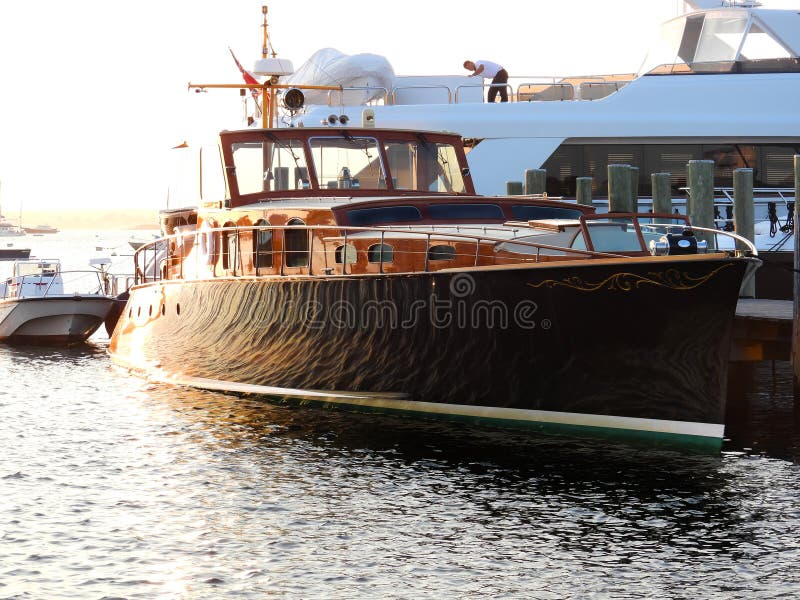 Boat Reflection of Sunset Colors from Ocean Waters on Watch Hill Rhode ...