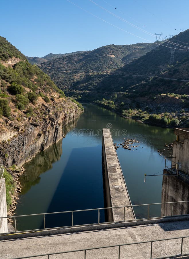 Boat Rising Inside the Lock of the Barragem Da Valeira Dam on the Douro ...