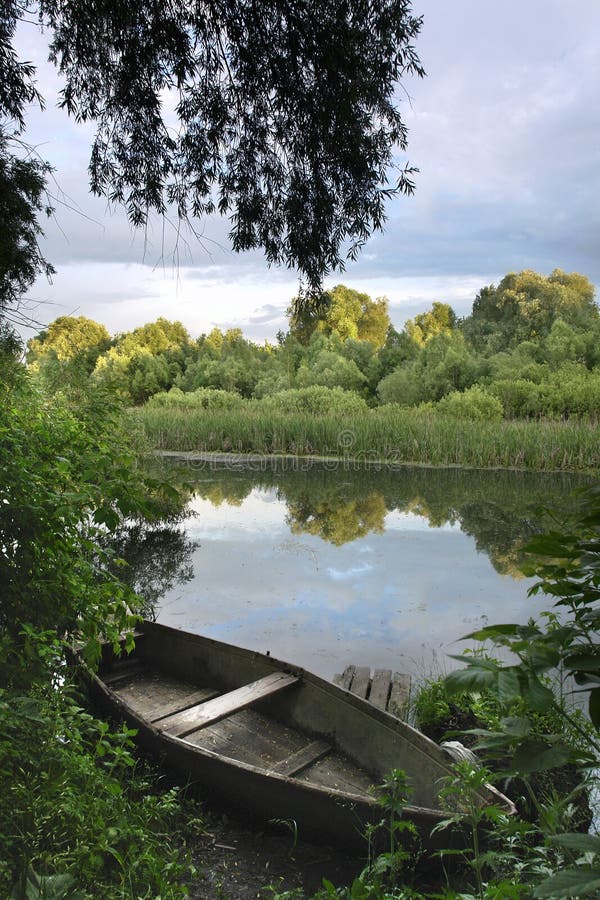 Boat on the river stock photo. Image of mood, serene, restful - 2592394