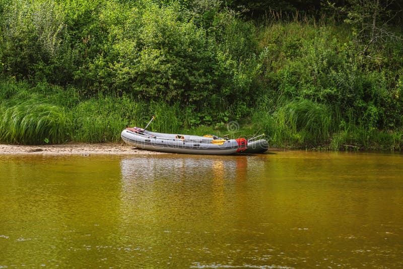 Boat on the river bank stock image. Image of tour, outdoor - 241773683