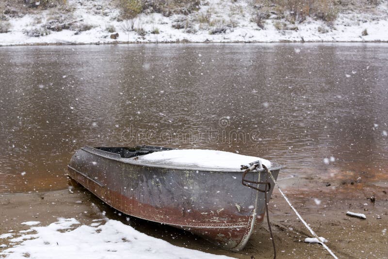 Boat on River. First Snow in Autumn on the River Stock Photo - Image of ...