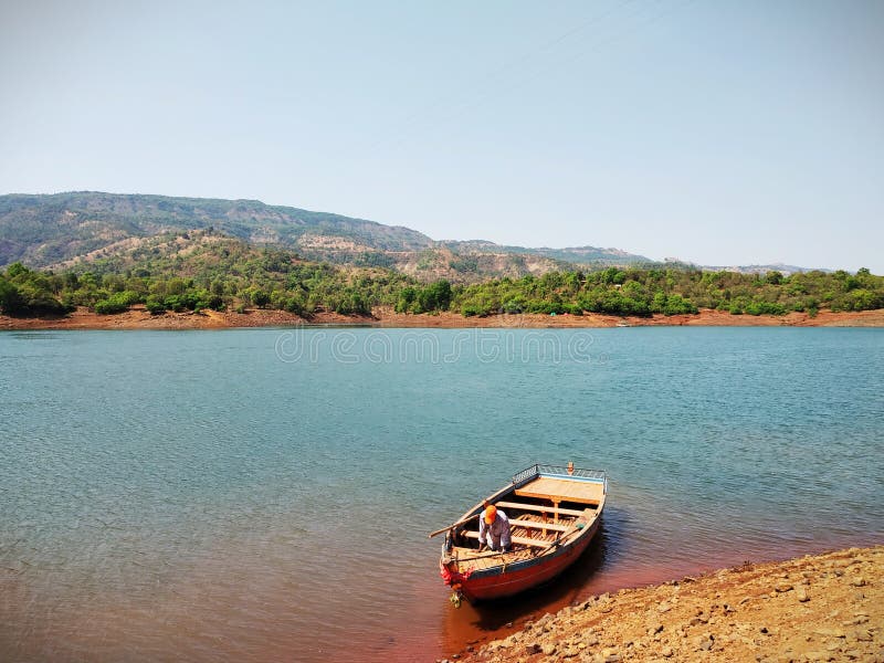Boat in the river stock image. Image of still, water - 146560583