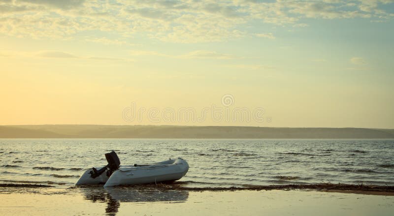Boat on the River in Sunset Time Stock Photo - Image of ripples, orange ...