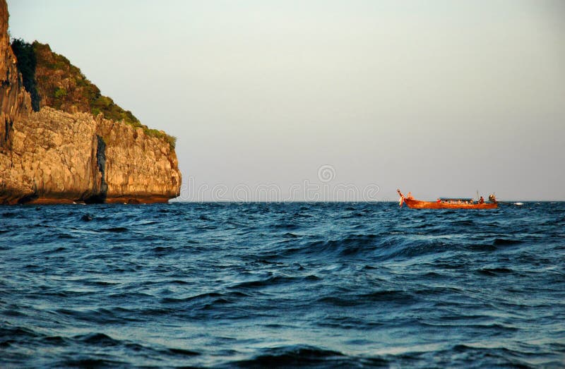 Boat and rock stock image. Image of thailand, ocean, float - 12039391