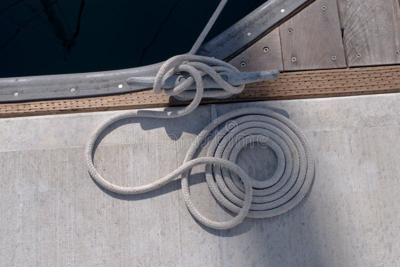 Boat rope tied to dock stock image. Image of sunny, boat - 71299129