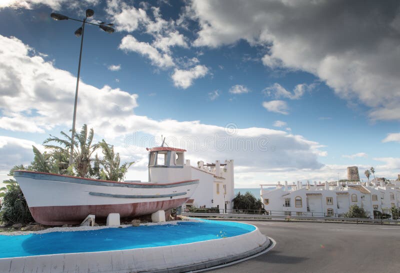 Boat on a Roundabout in Torremuelle Stock Photo - Image of travel ...