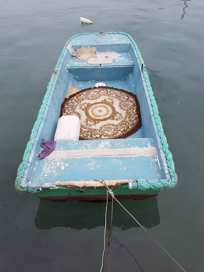 A boat with a rug. Success stock image. Image of success - 131436721