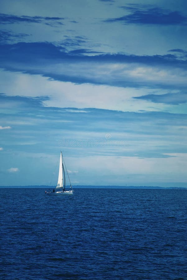Boat Sailing at Blue Sea stock photo. Image of water - 57012514