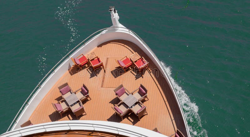 Boat Sailing on the River, Bow with Tables and Chairs Stock Photo ...
