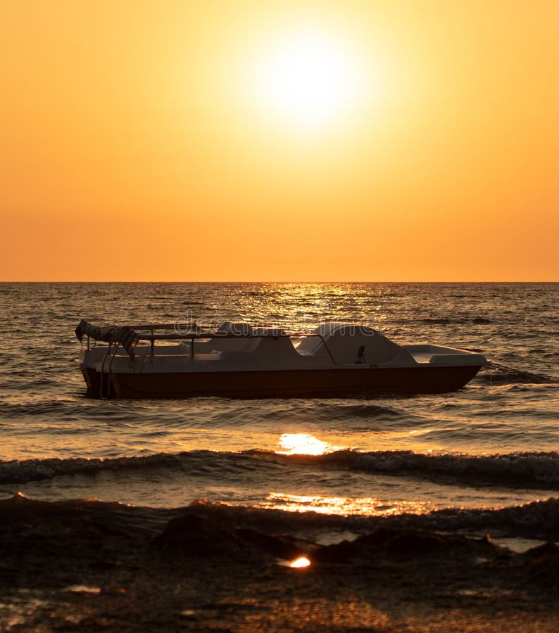 Boat on the Seashore at Sunset Stock Photo - Image of horizon, tourism ...