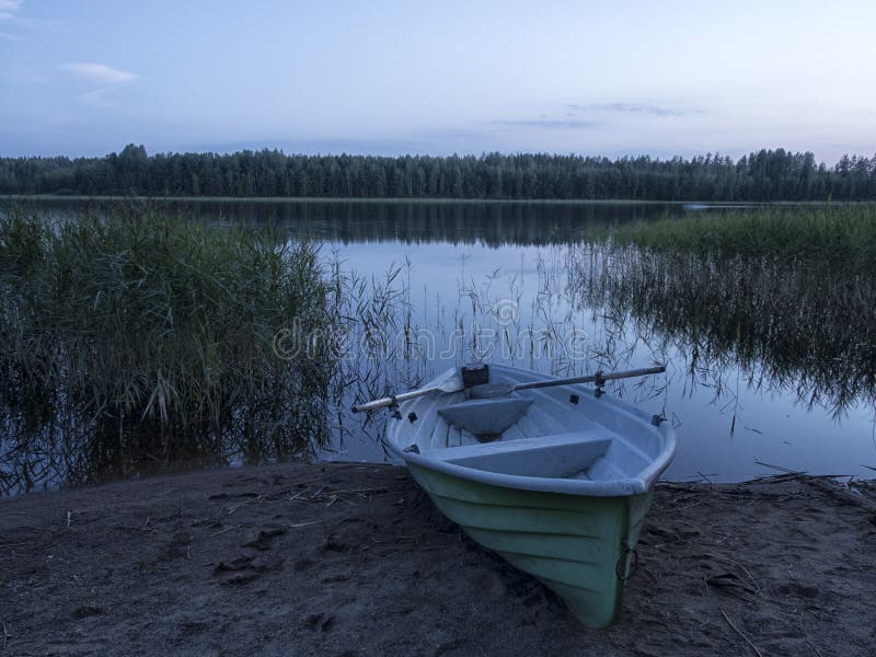 Boat on the Shore of a Forest Lake Stock Photo - Image of boats, park ...