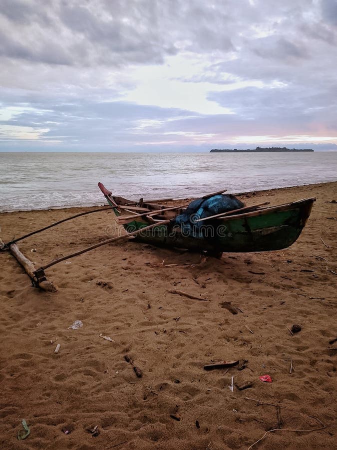 The Boat is on the Shore of the Muaro Shadow Coast Stock Photo - Image ...