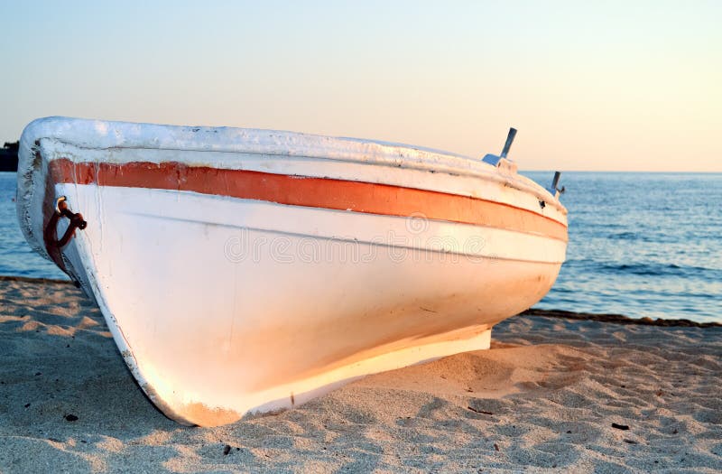 Boat on the shore stock photo. Image of scenic, seaside - 48620930