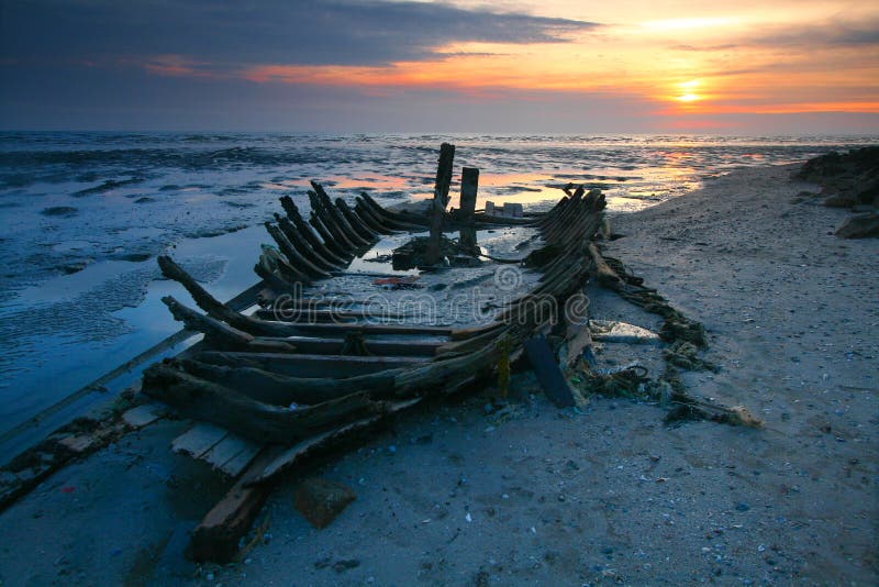 Boat Skeleton on Shore at Sunset Stock Photo - Image of wallpaper ...