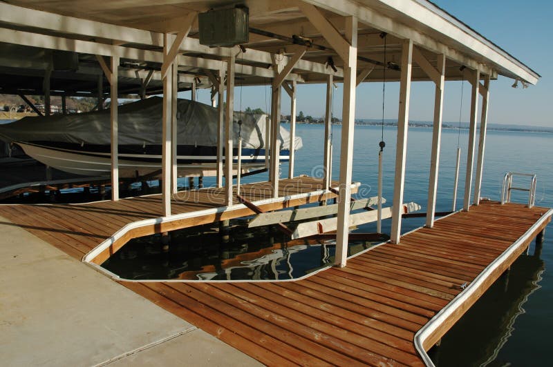 Boat Slip stock photo. Image of dock, family, estate, boat - 555608