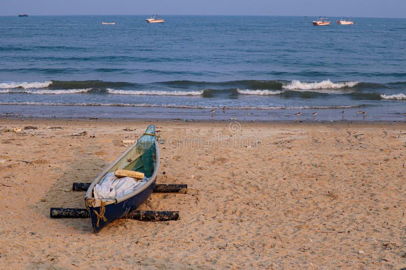 The a Boat Standing Near a Sea on the Sand with Waves of Ocean Stock ...