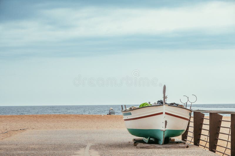 Boat Stranded on the Beach with the Sea Horizon in the Background Stock ...