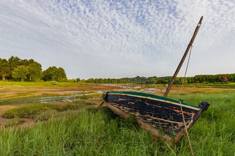 Boat stranded in the grass stock photo. Image of boat - 153436904