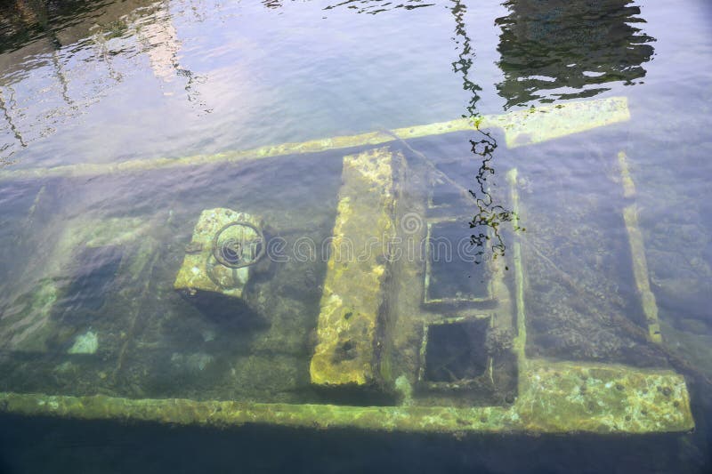 A Boat Sunk at a Shallow Depth in a Sea Bay Stock Photo - Image of ...