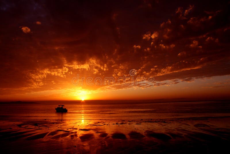 A boat at sunrise stock photo. Image of deep, boat, relaxing - 4845236