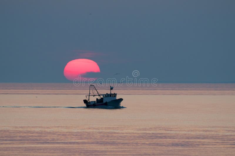 Boat in Sunset on the Horizon Above Sea Stock Image - Image of sail ...