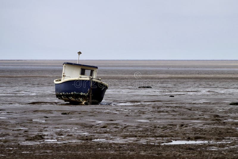 Boat in tide out stock photo. Image of boat, wave, sand - 79172128