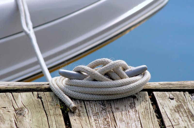 Boat Tied To Dock stock photo. Image of tied, nautical - 26781576