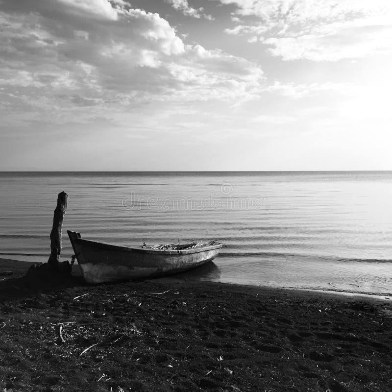 Boat stock photo. Image of tied, post, shore, lake, boat - 54520520
