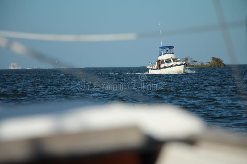 Boat Traveling on Water Approaching Shot from Another Boat 11 P Stock ...