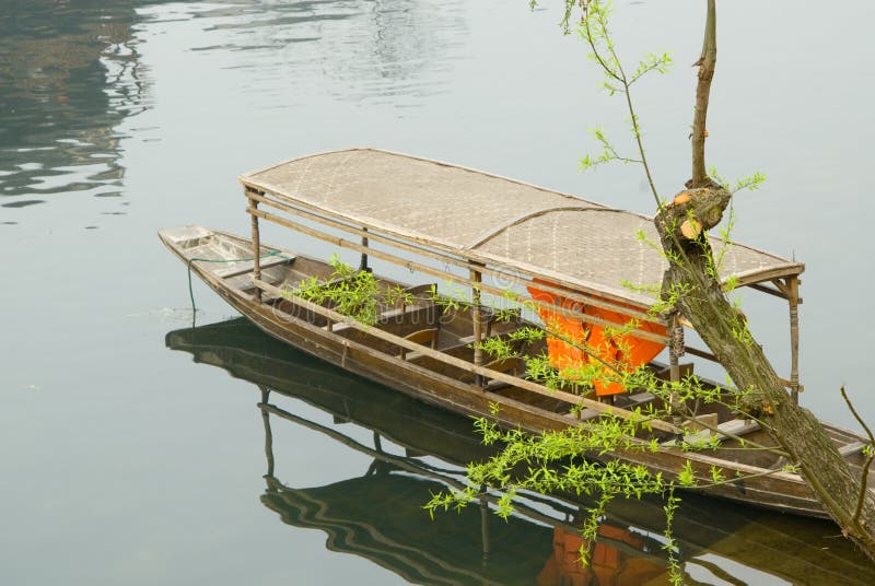 A boat and tree stock image. Image of paradise, water - 9223405