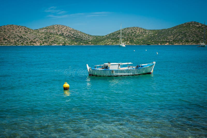 Boat on the Turquoise Water, Greece, Crete, Island Behind Stock Photo ...