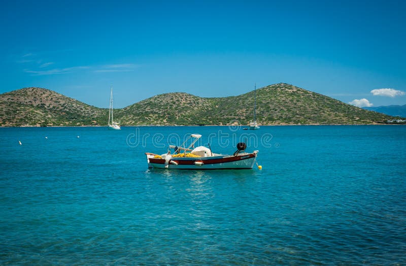 Boat on the Turquoise Water, Greece, Crete, Island Behind Editorial ...
